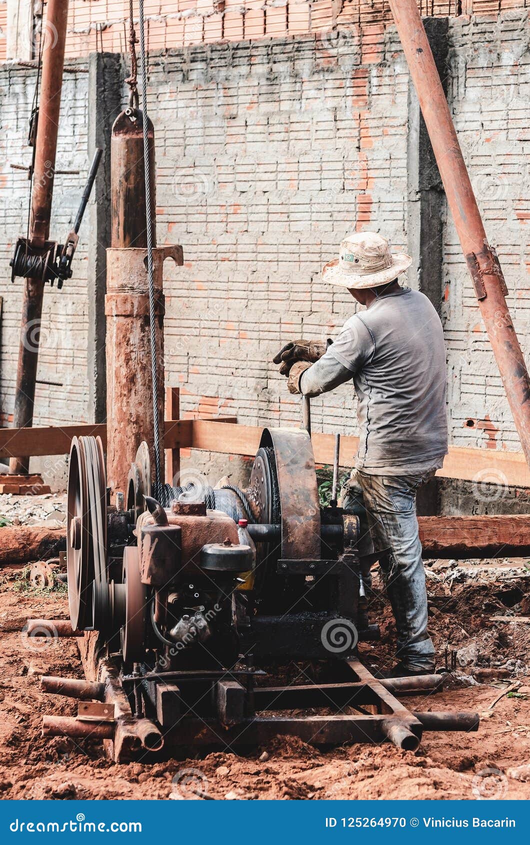 Construction Worker Using a Pile Driver Editorial Image - Image of ...