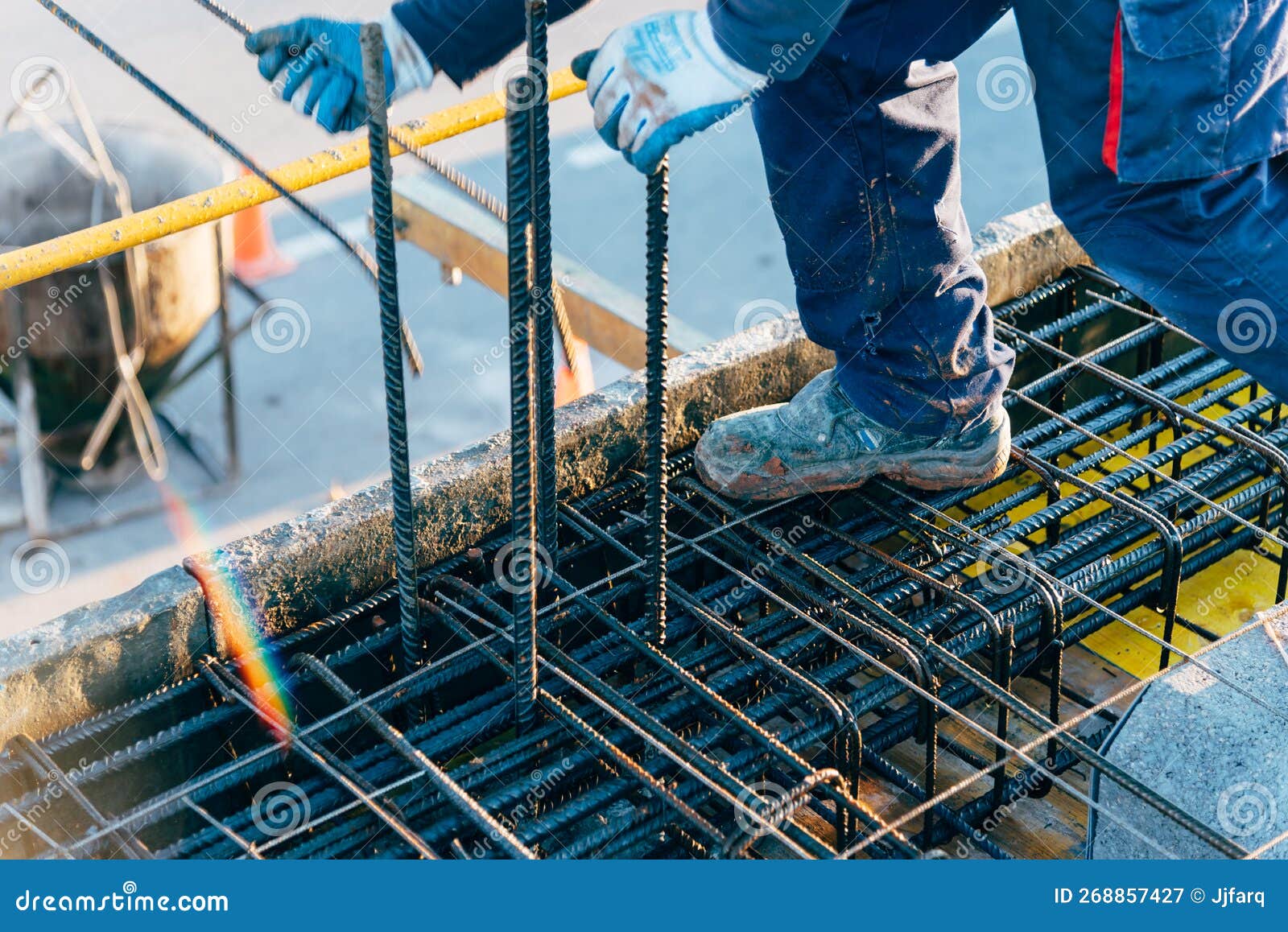 Construction Worker Using Safety Rules is Working on a Reinforced ...