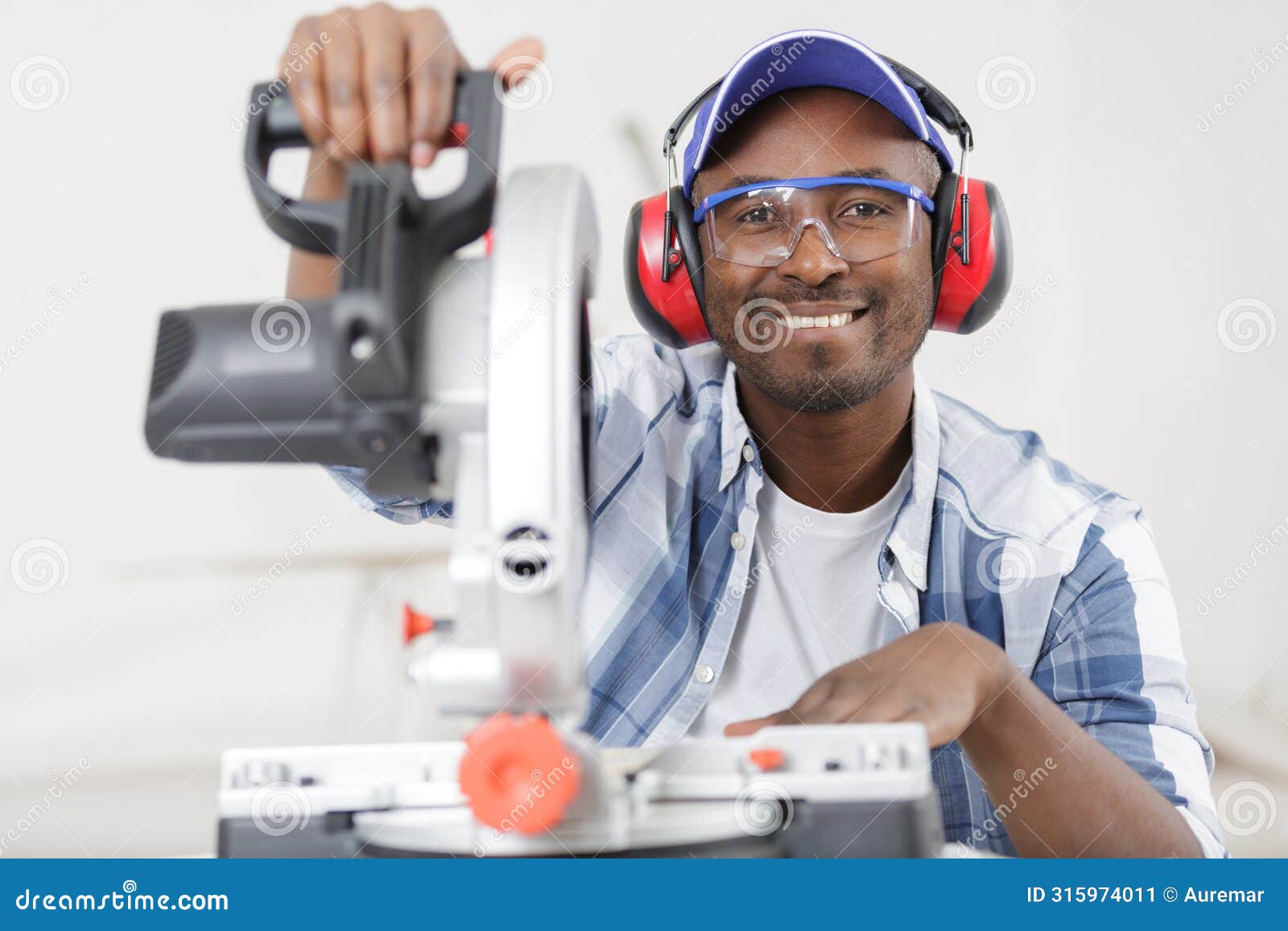 Construction Worker Using Slider Compound Mitre Saw Stock Image - Image ...