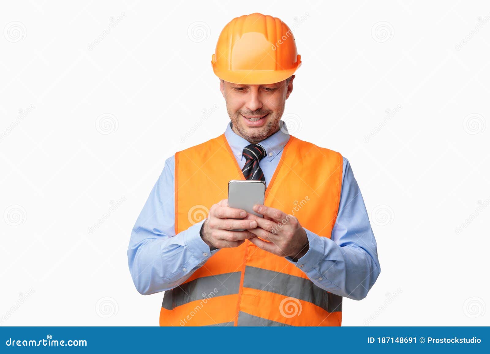 Construction Worker Using Smartphone Standing on White Studio ...