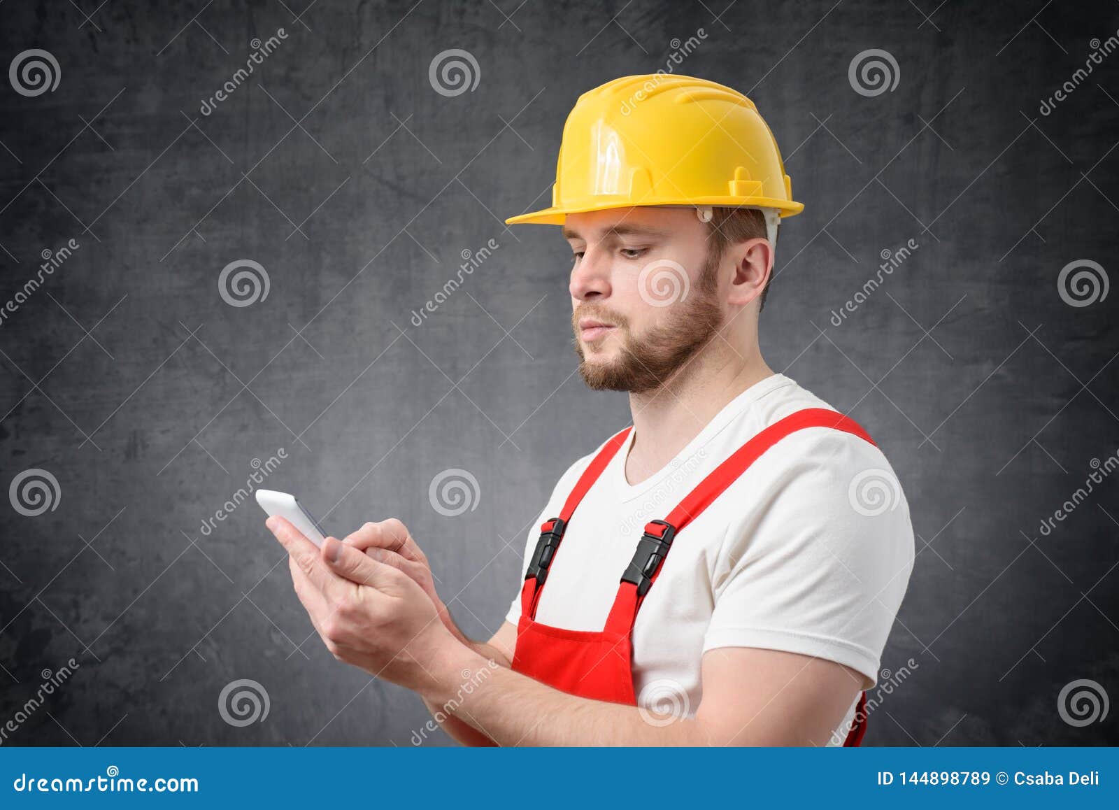 Construction Worker Using Smartphone Stock Image - Image of phone ...
