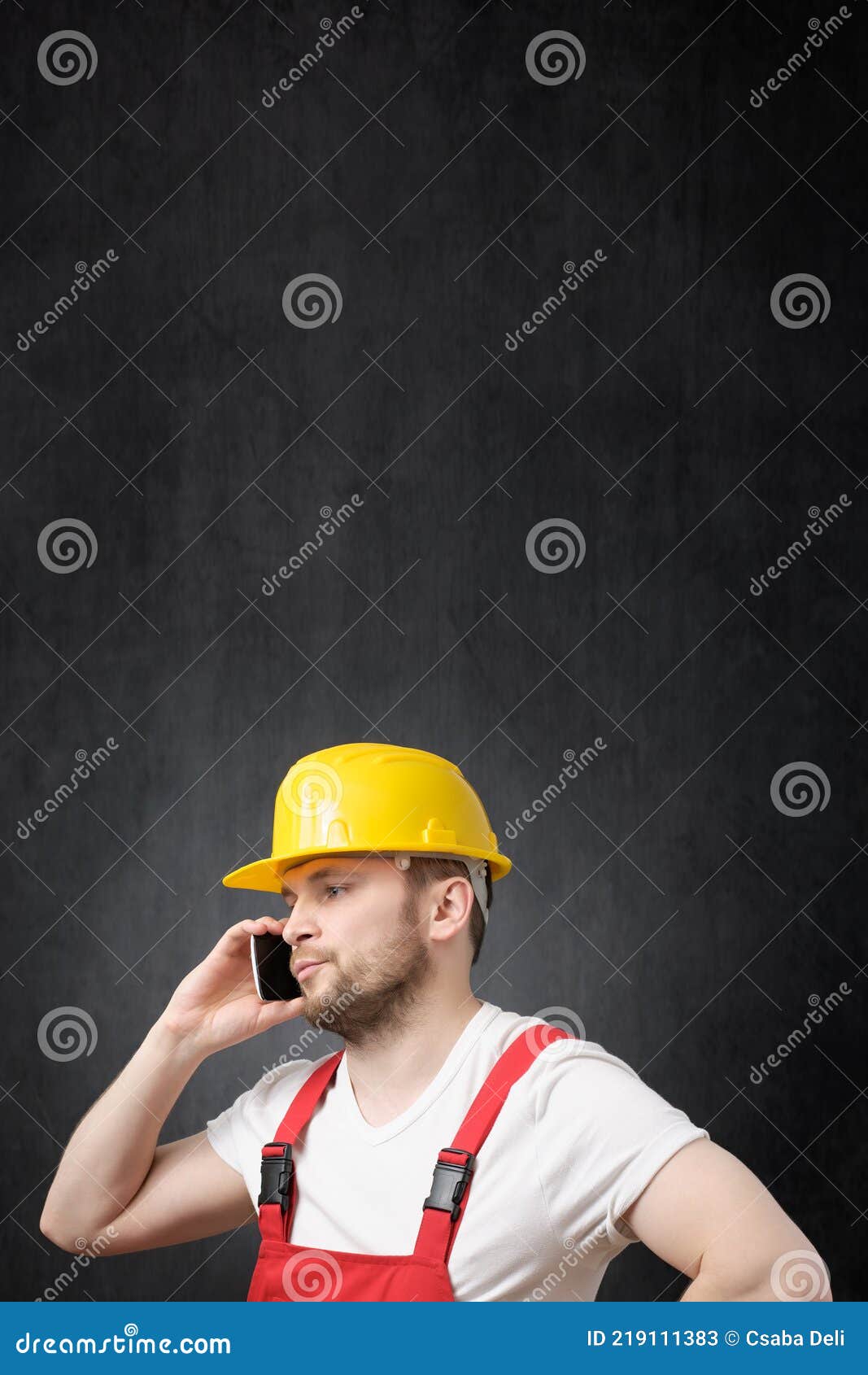 A Construction Worker Using Smartphone Stock Image - Image of builder ...