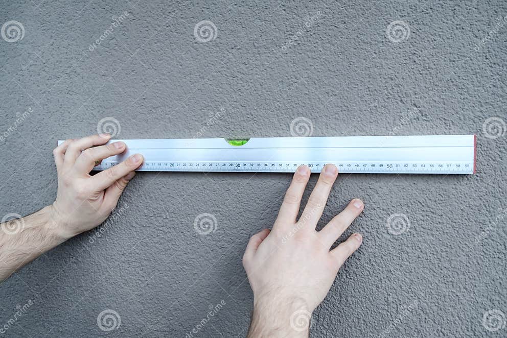 Construction Worker Using Spirit Level Stock Image - Image of liquid ...