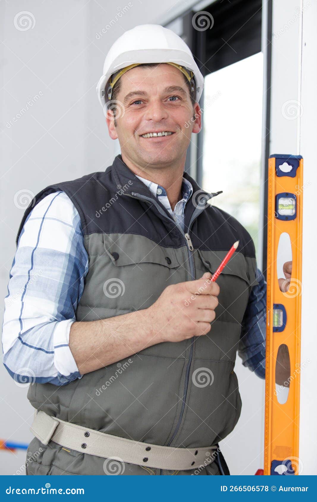 Construction Worker Using Spirit Level in New House Stock Photo - Image ...