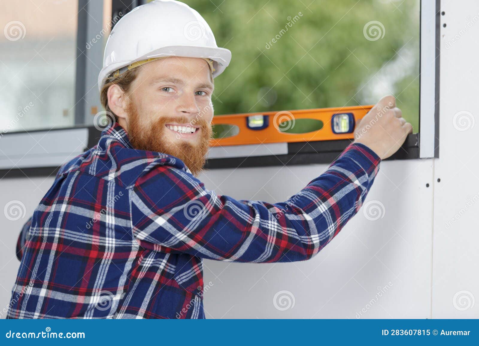 Construction Worker Using Spirit Level in New House Stock Image - Image ...
