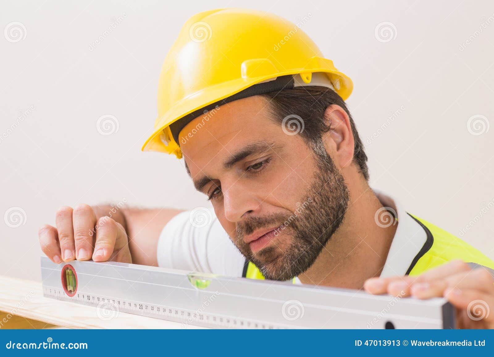 Construction Worker Using Spirit Level Stock Image - Image of working ...