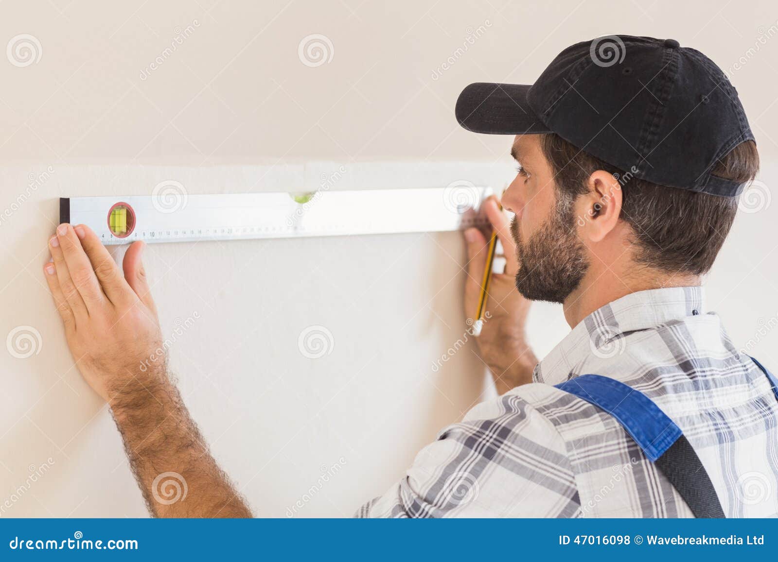 Construction Worker Using Spirit Level Stock Photo - Image of worker ...