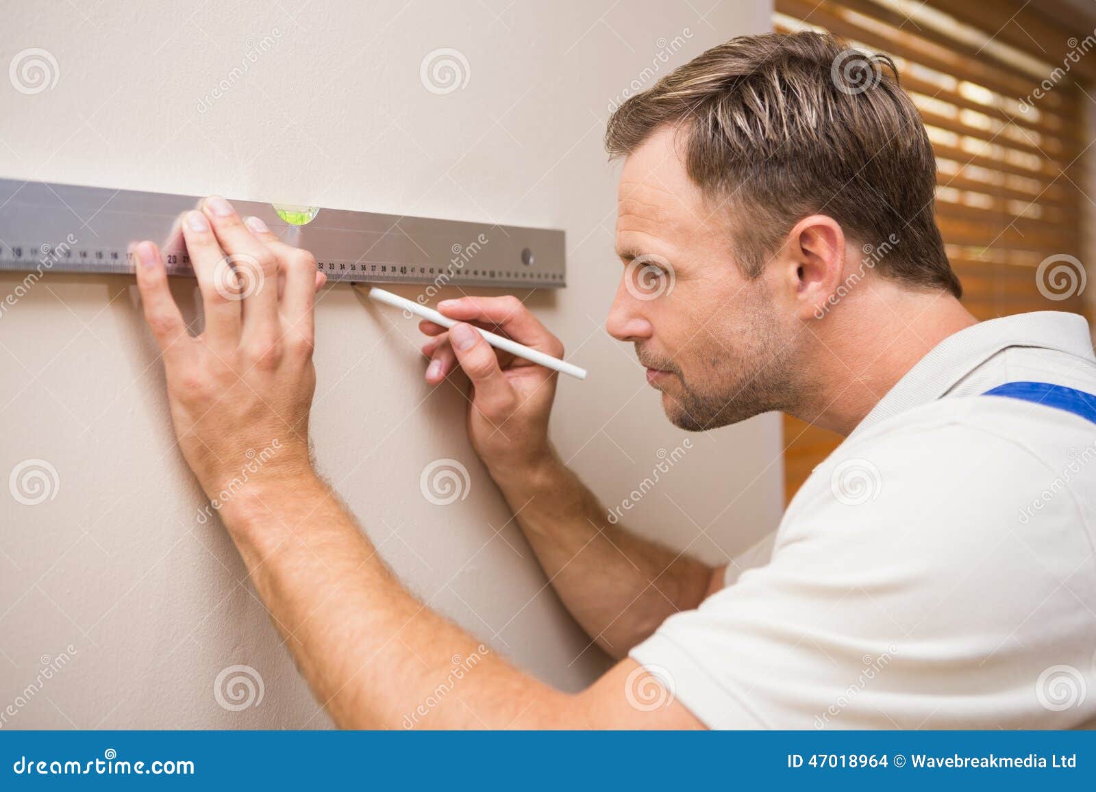 Construction Worker Using Spirit Level Stock Photo - Image of person ...