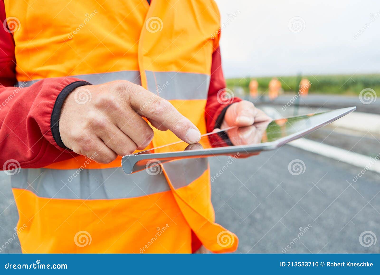 Construction Worker Using Tablet Computer during Construction Planning ...