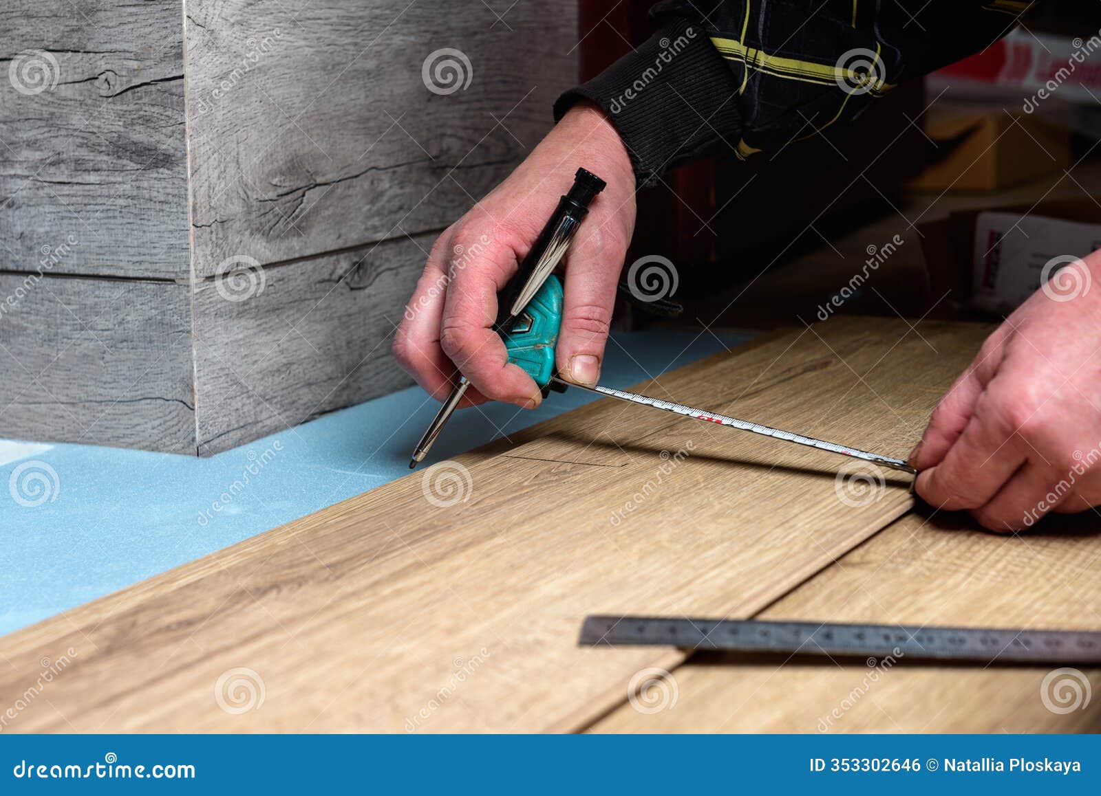 Construction Worker Using Tape Measure Ruler Measuring Laminate Board ...