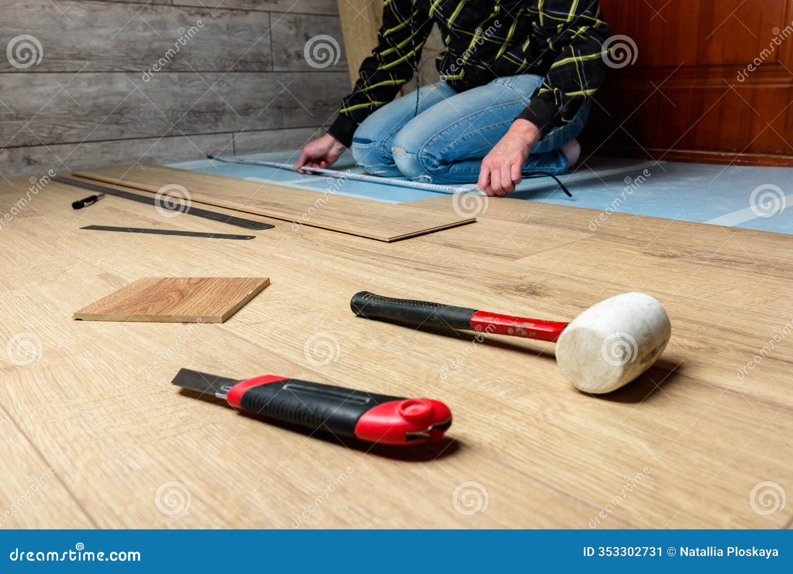 Construction Worker Using Tape Measure Ruler Measuring Laminate Board ...