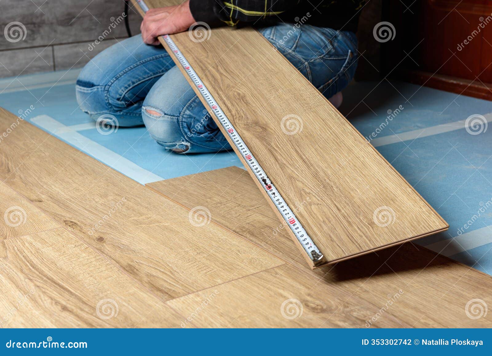 Construction Worker Using Tape Measure Ruler Measuring Laminate Board ...