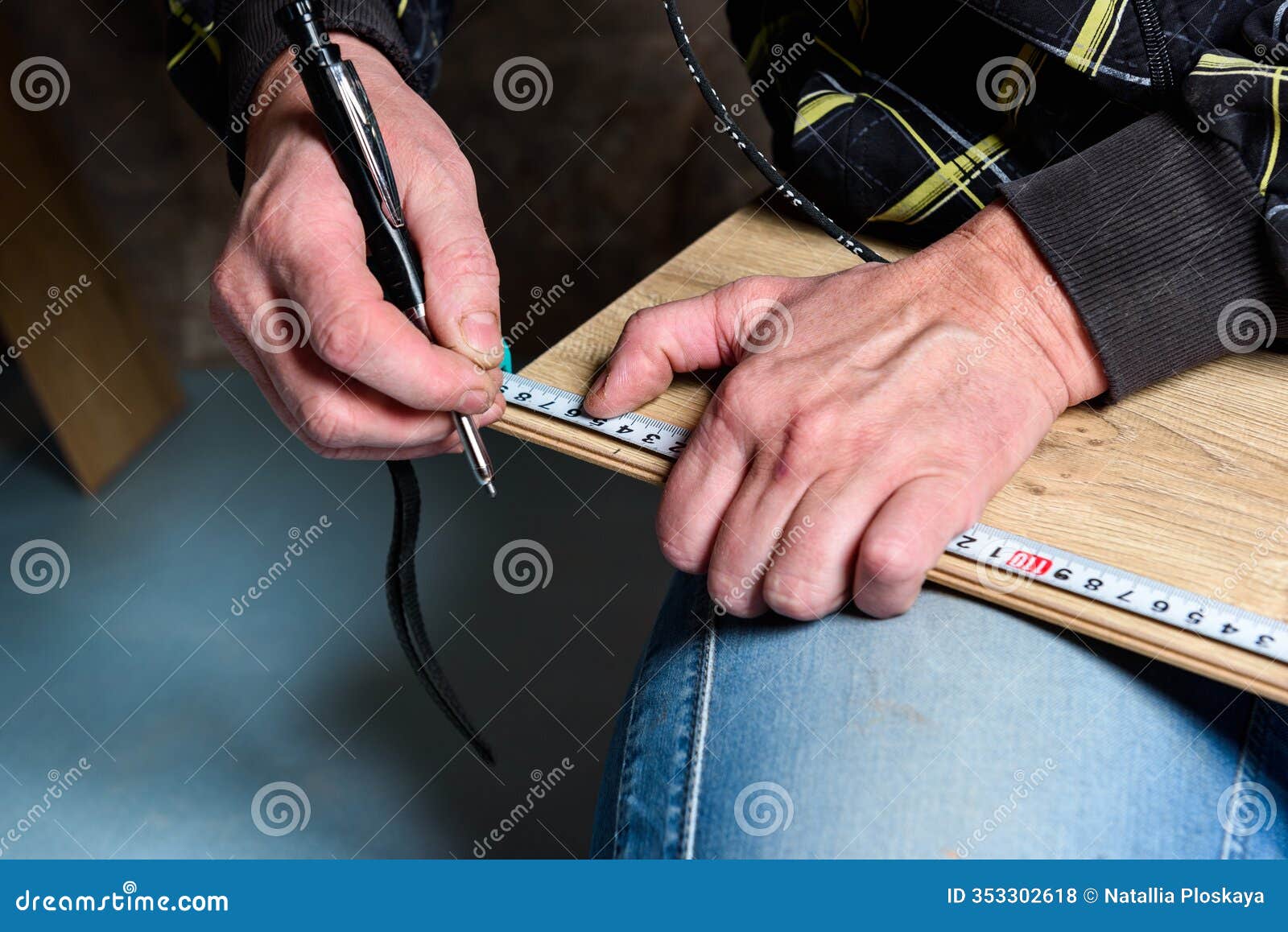 Construction Worker Using Tape Measure Ruler Measuring Laminate Board ...