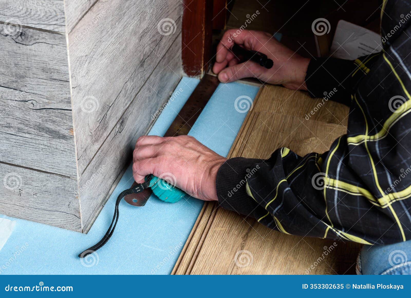 Construction Worker Using Tape Measure Ruler Measuring Laminate Board ...