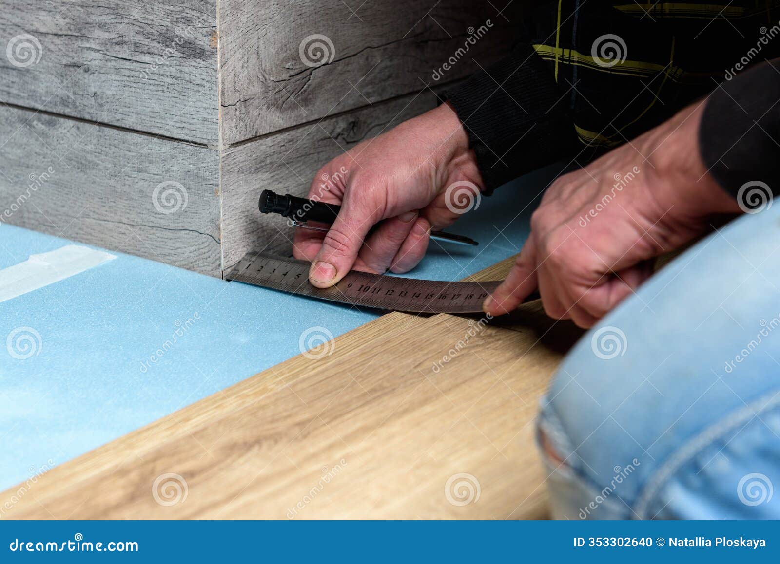 Construction Worker Using Tape Measure Ruler Measuring Laminate Board ...