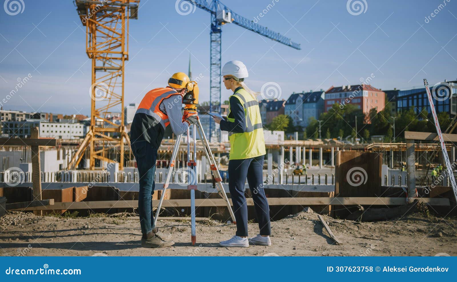 Construction Worker Using Theodolite Surveying Optical Instrument for ...