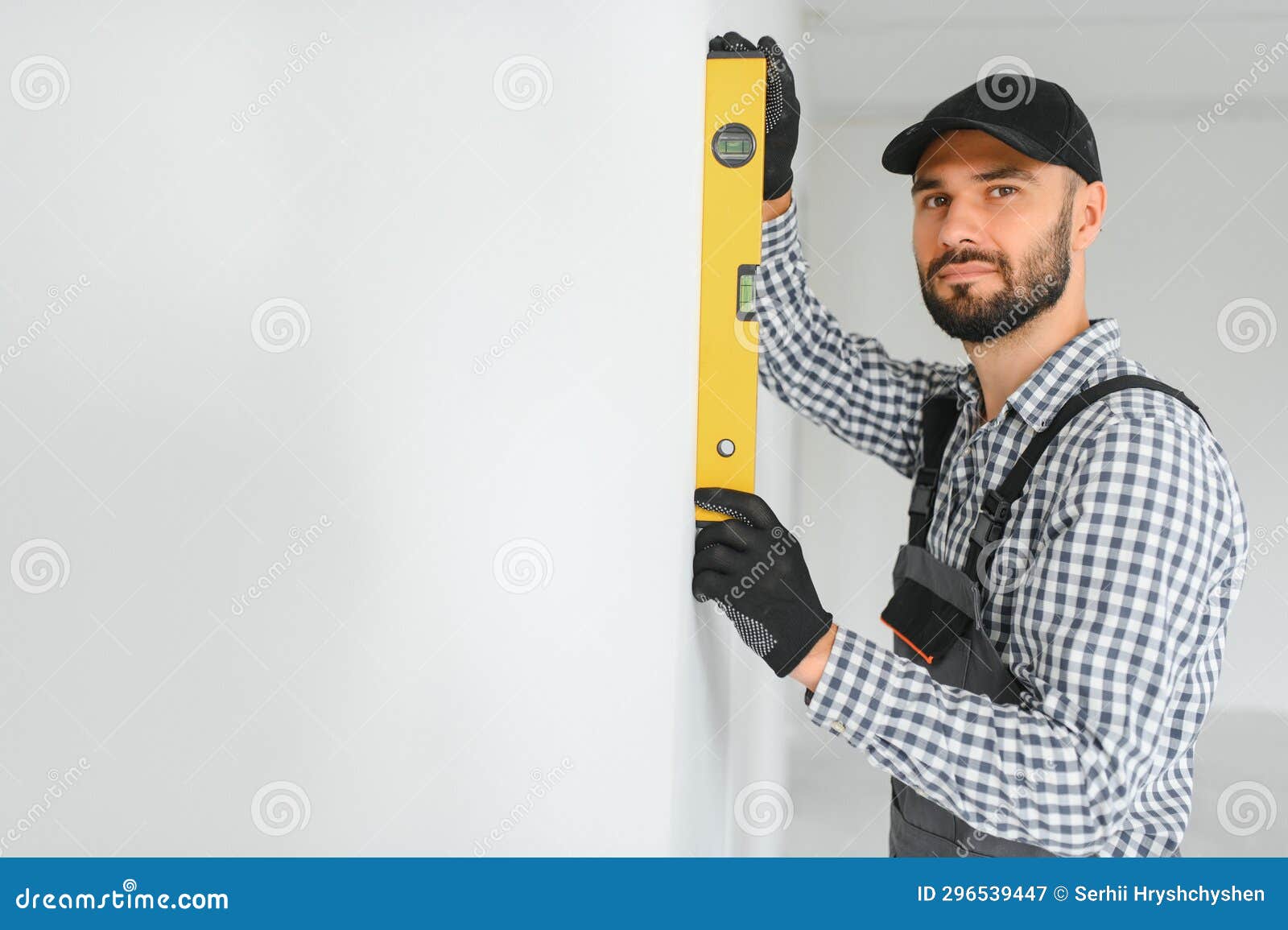 Construction Worker Using a Water Level. Stock Image - Image of manual ...