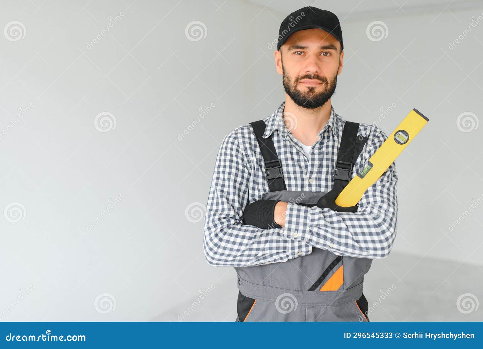 Construction Worker Using a Water Level. Stock Image - Image of male ...