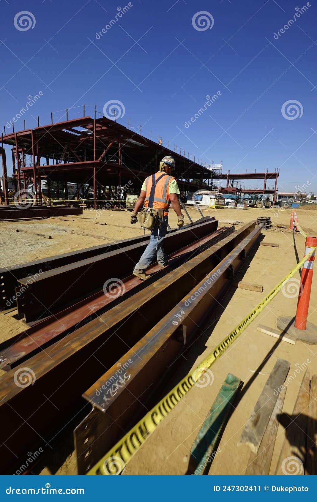 Construction Worker Walking on I-beams at the Construction Location ...