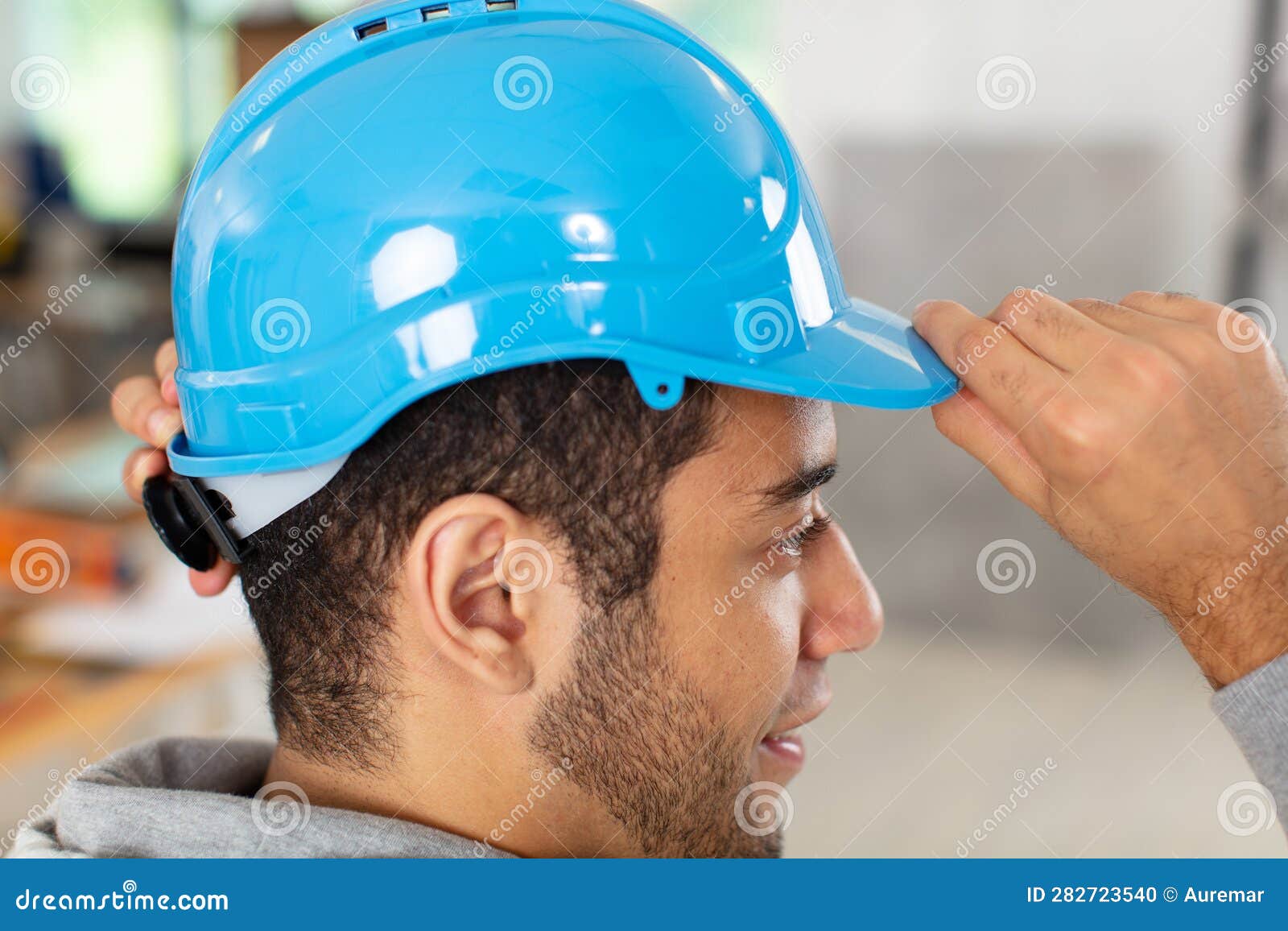 Construction Worker Wearing Blue Helmet Stock Photo - Image of ...