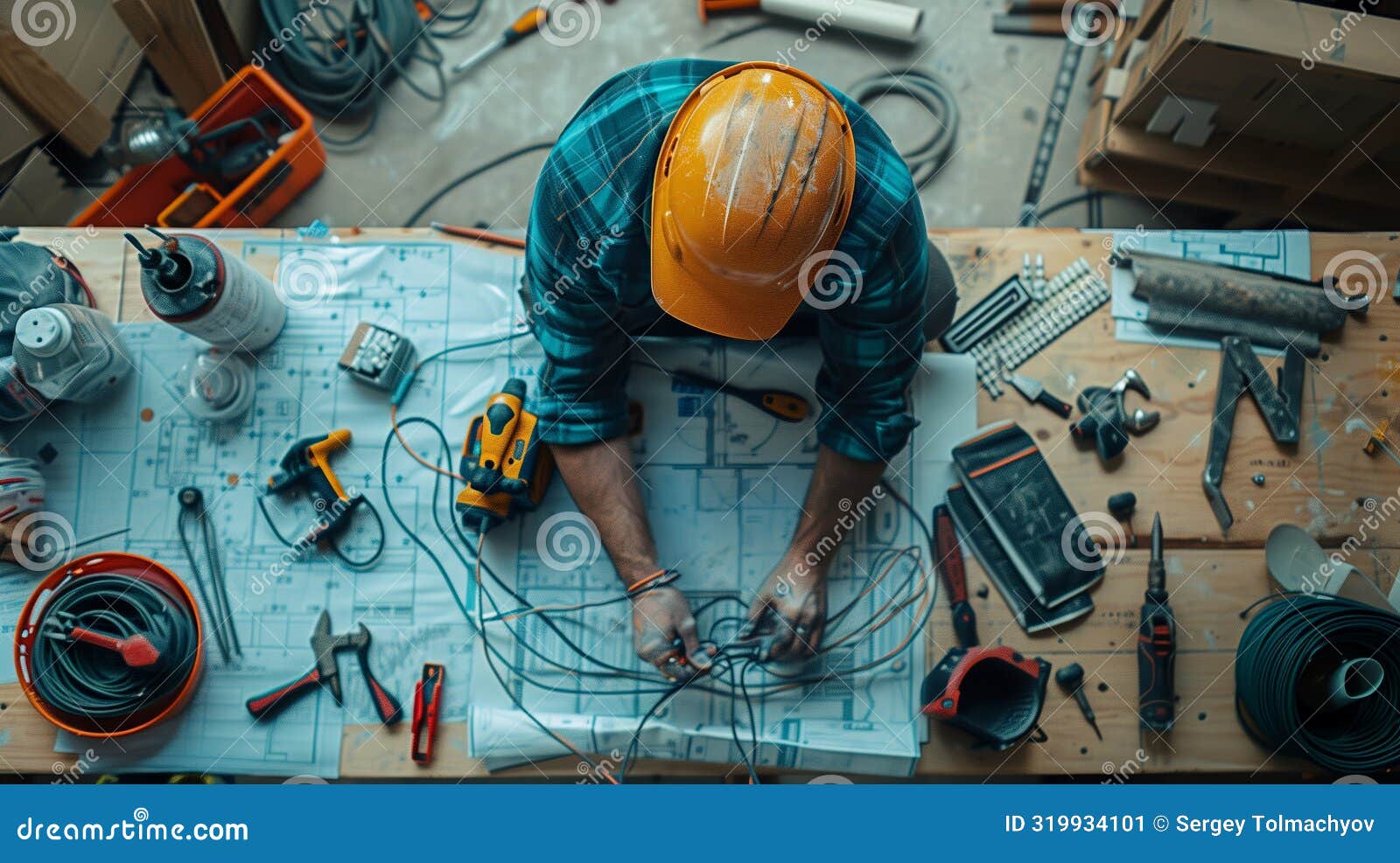 Construction Worker Focuses on Electrical Wiring Project at Busy Workbench during Daytime. Stock ...