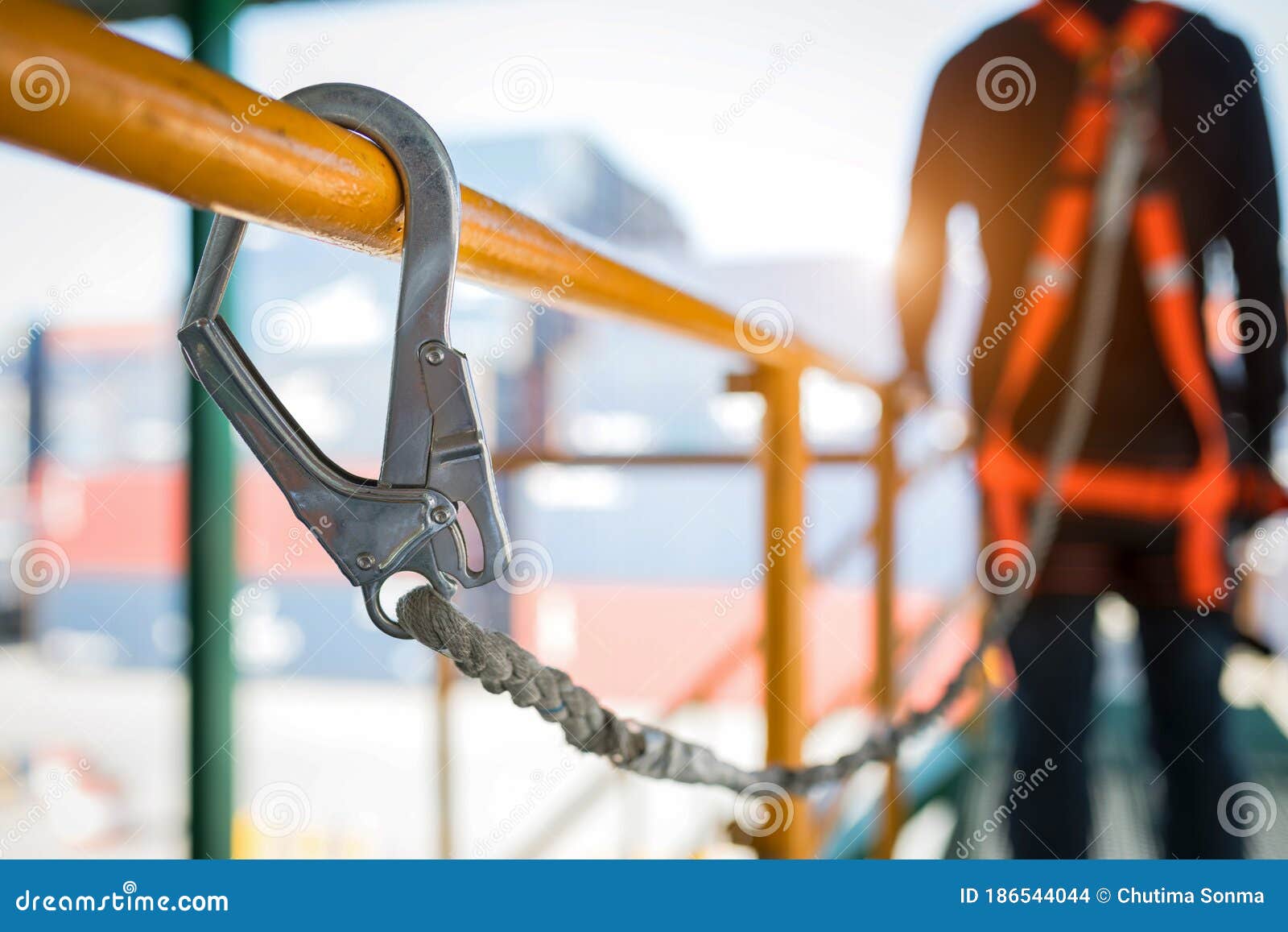 Construction Worker Wearing Safety Harness and Safety Line Working at ...