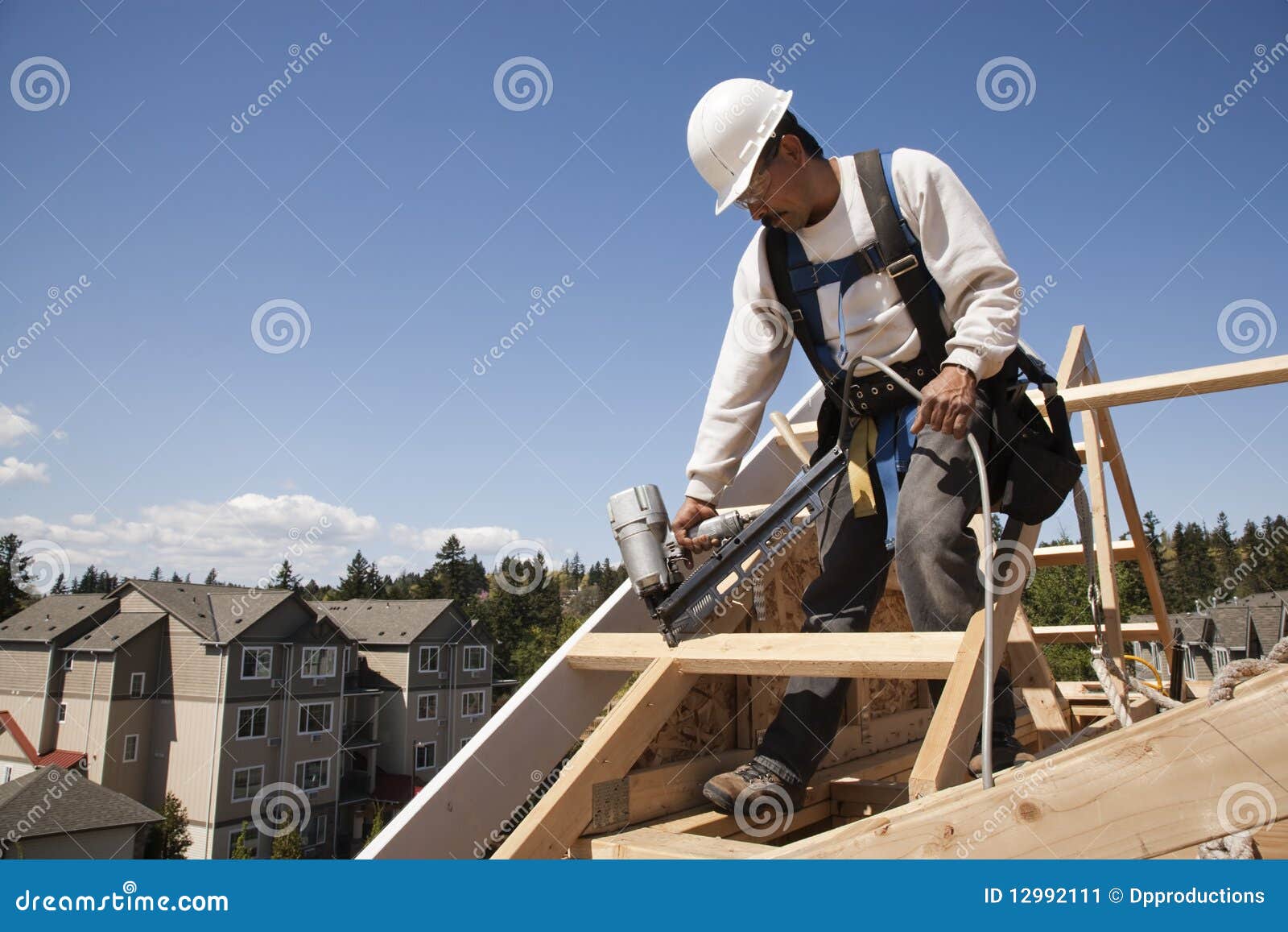 Construction Worker at Work Stock Image - Image of adult, nailing: 12992111