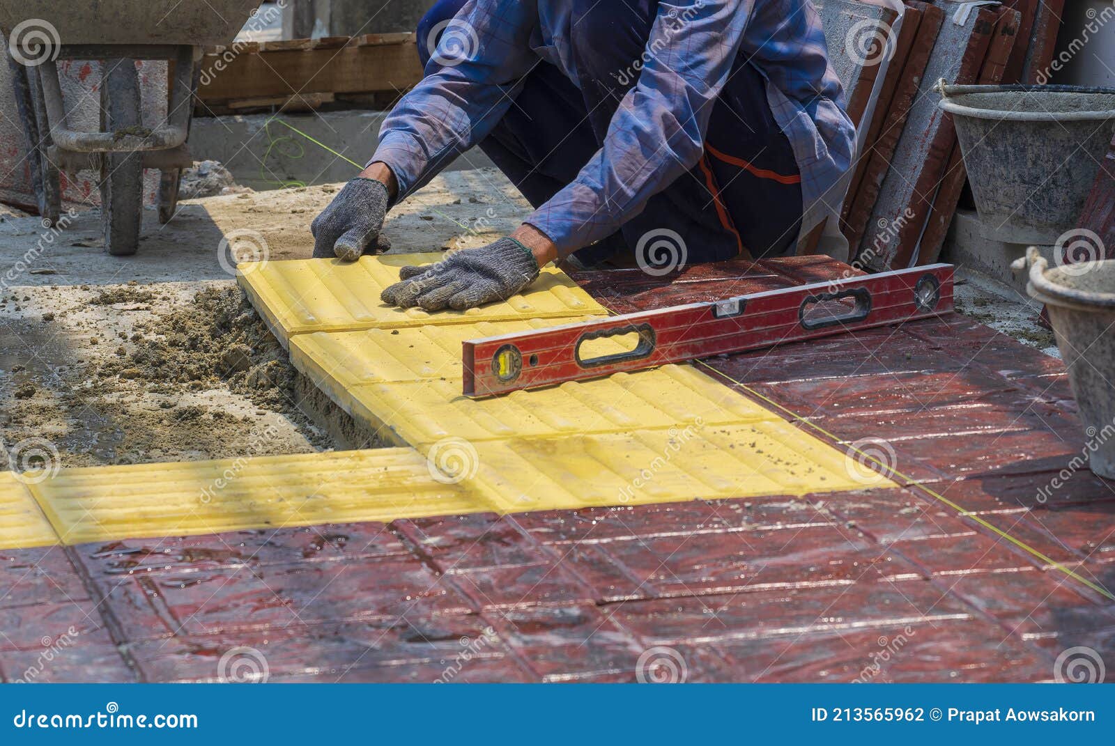 Construction Worker with Work Tools is Installing and Laying Concrete ...