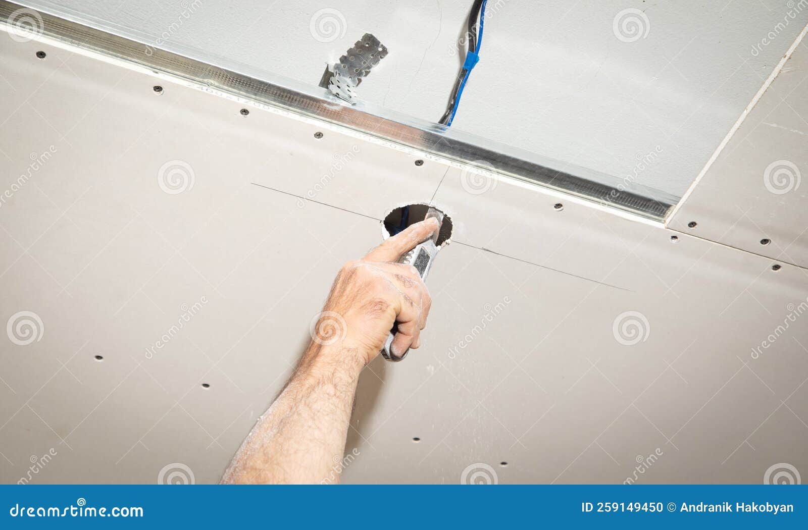 Construction Worker Working on Ceiling at Home Stock Photo - Image of ...