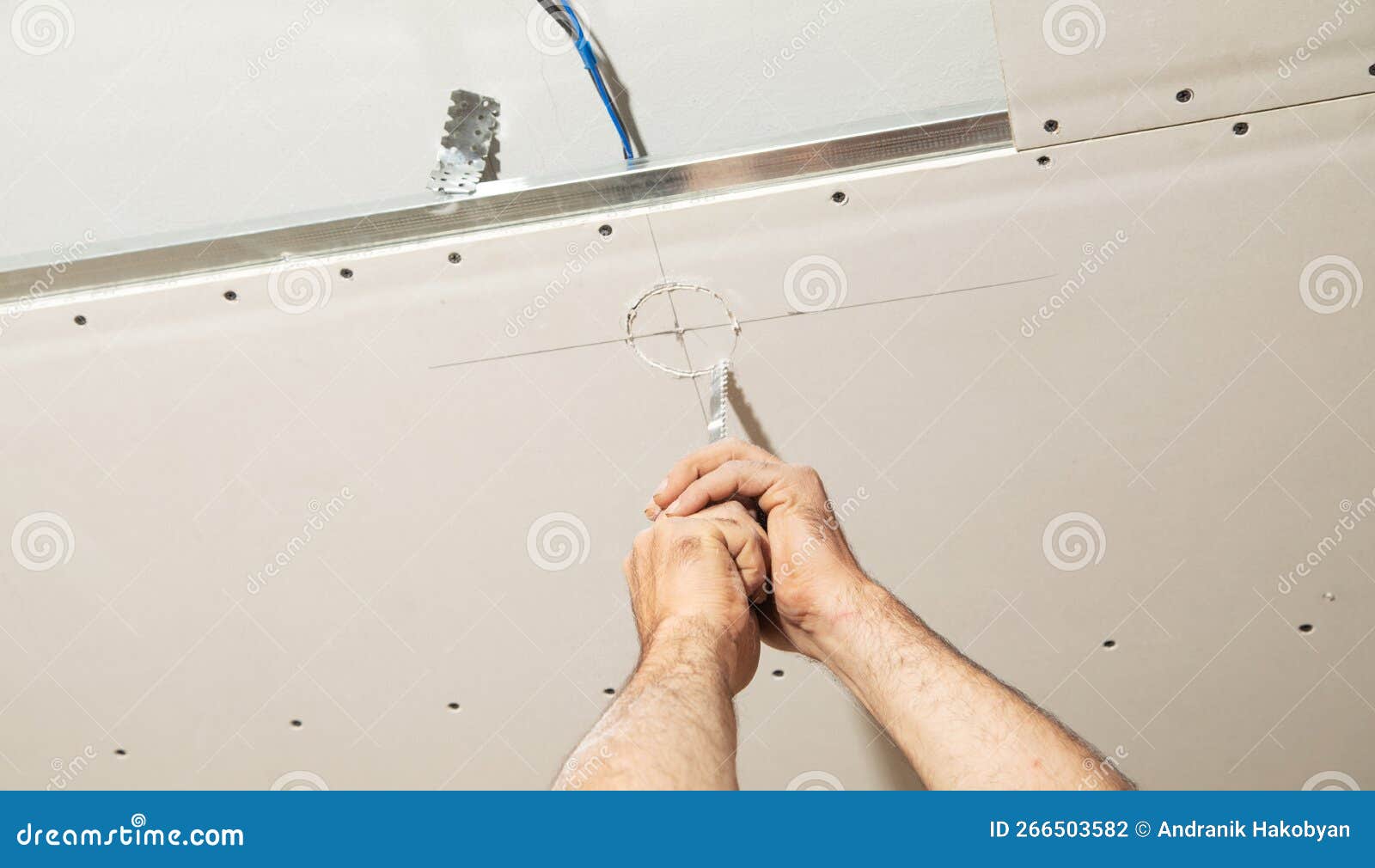 Construction Worker Working on Ceiling at Home Stock Photo - Image of ...