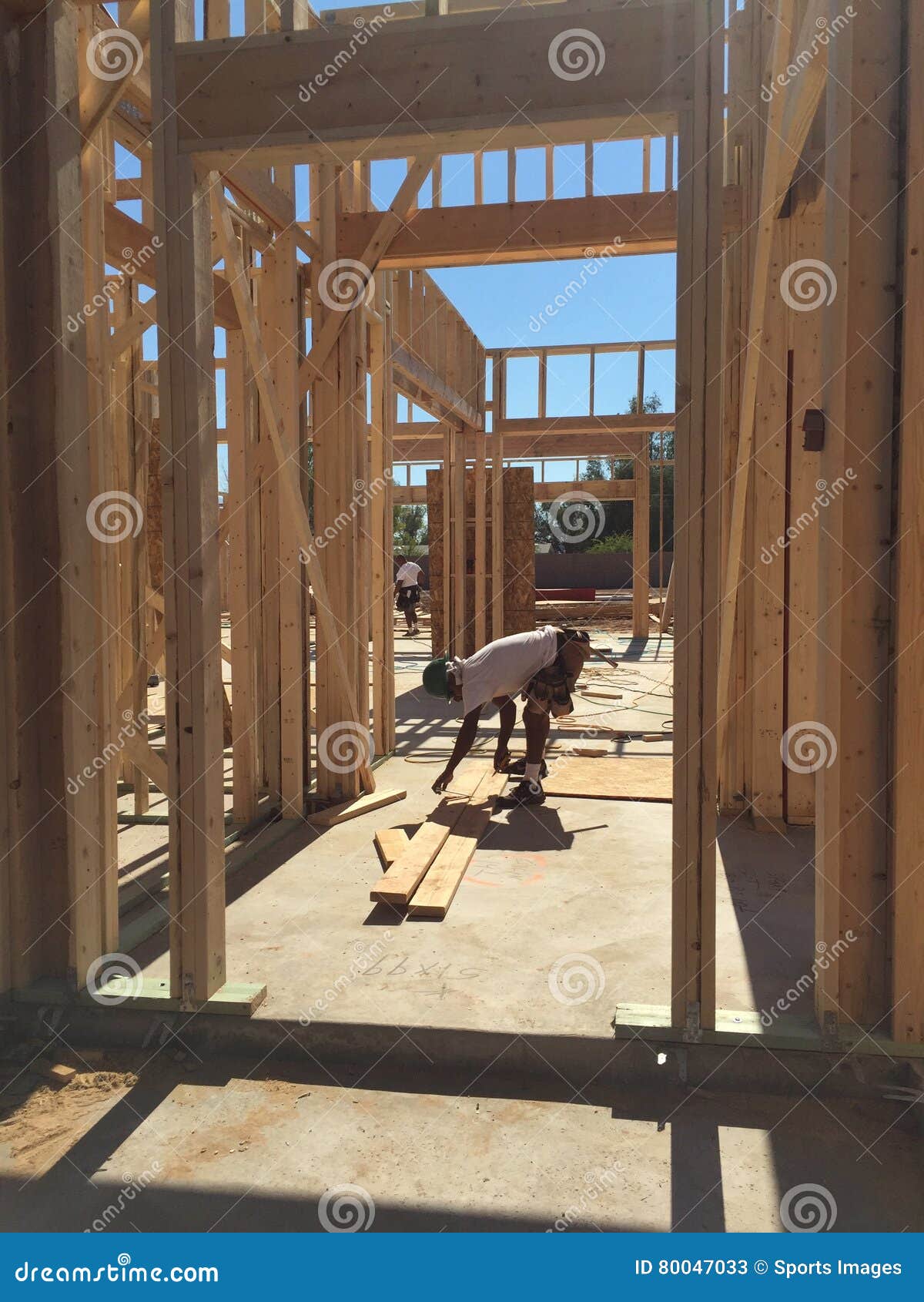 Construction Worker Working on the Framing Process for a New a House ...