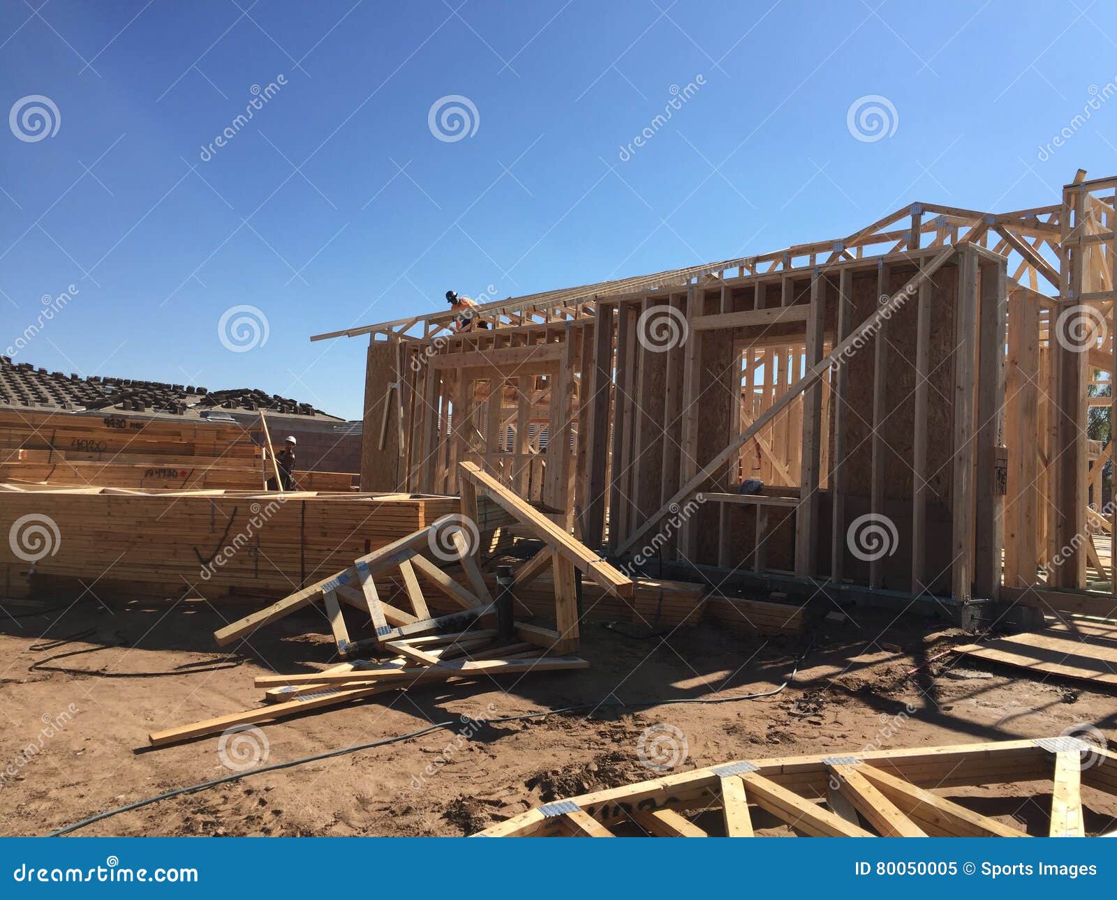 Construction Worker Working on the Framing Process for a New a House ...