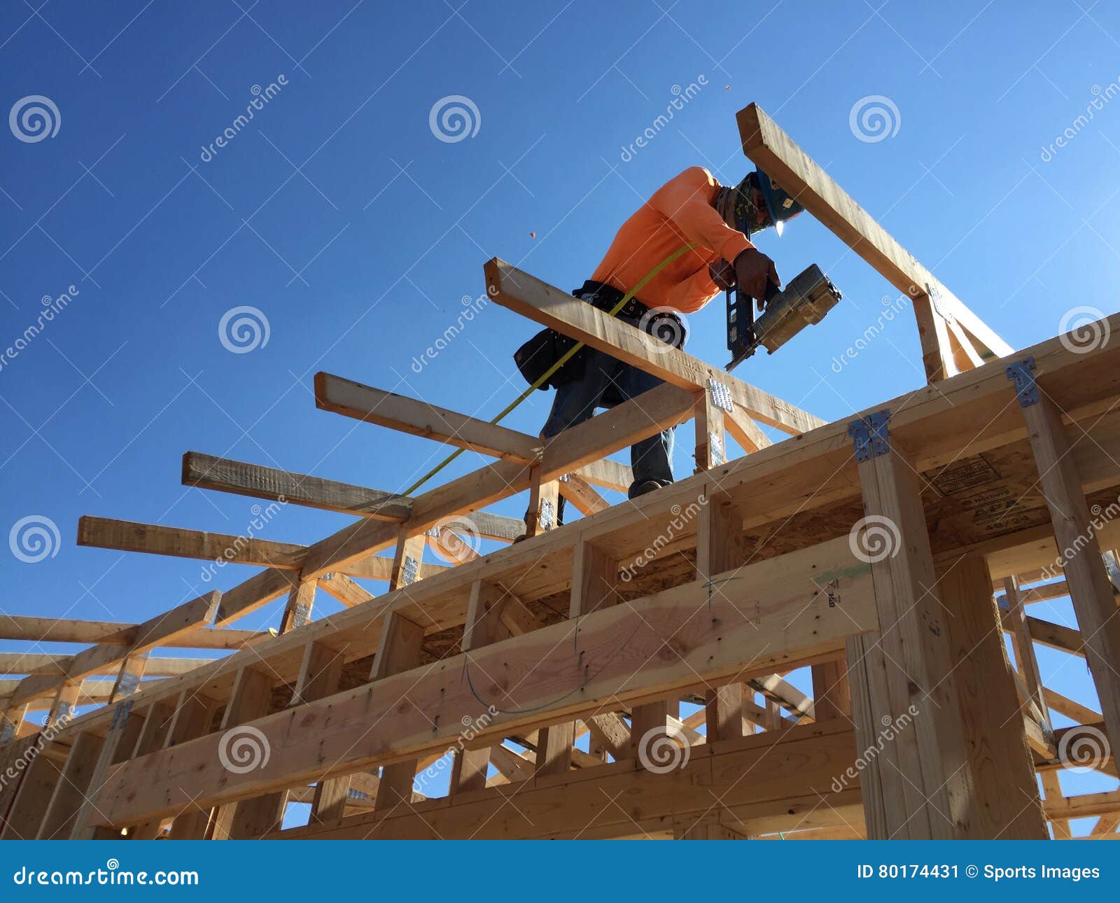 Construction Worker Working on the Framing Process for a New a House ...