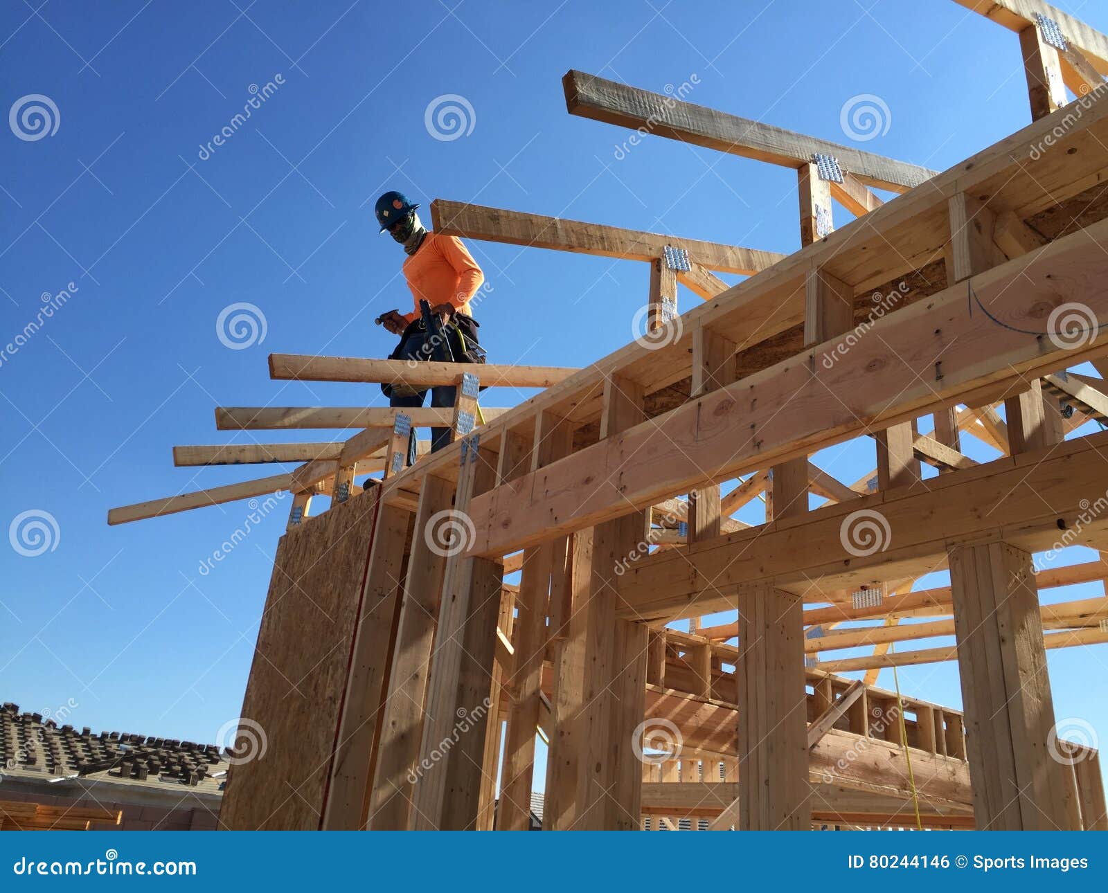 Construction Worker Working on the Framing Process for a New a House ...