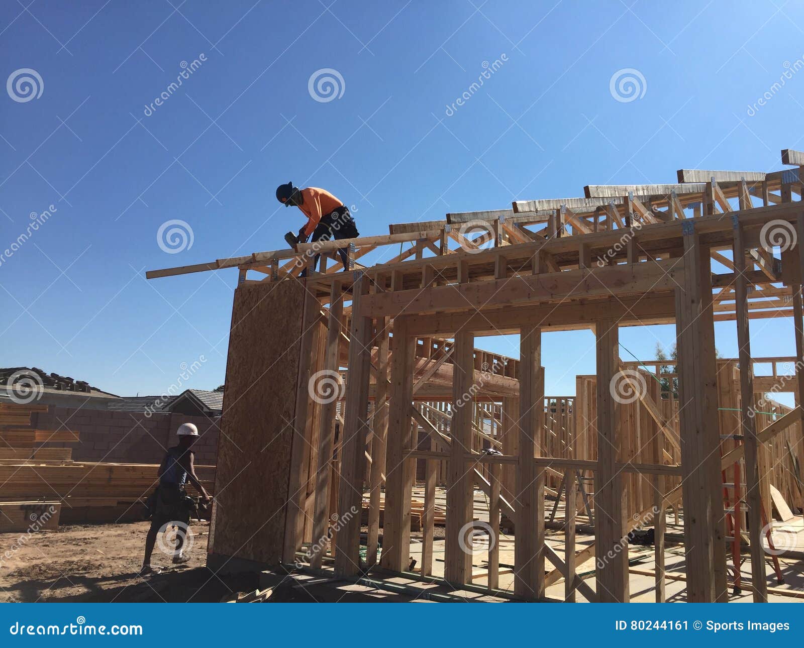 Construction Worker Working on the Framing Process for a New a House ...