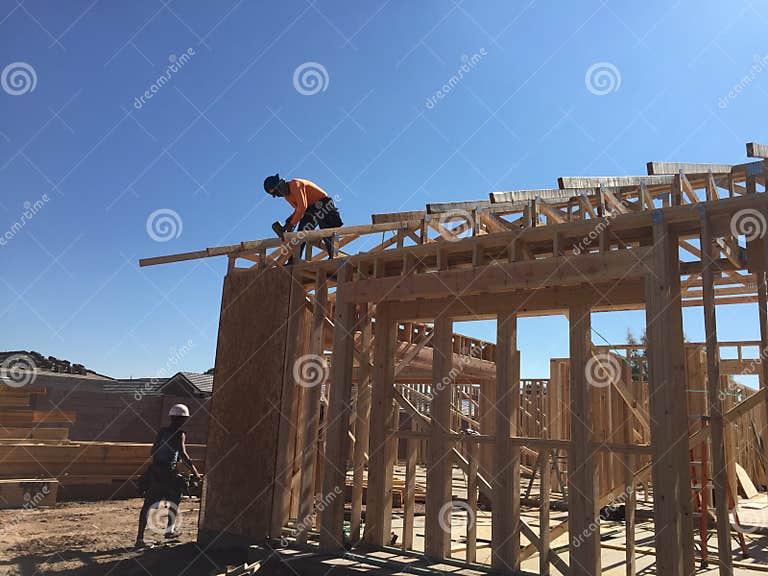 Construction Worker Working on the Framing Process for a New a House ...