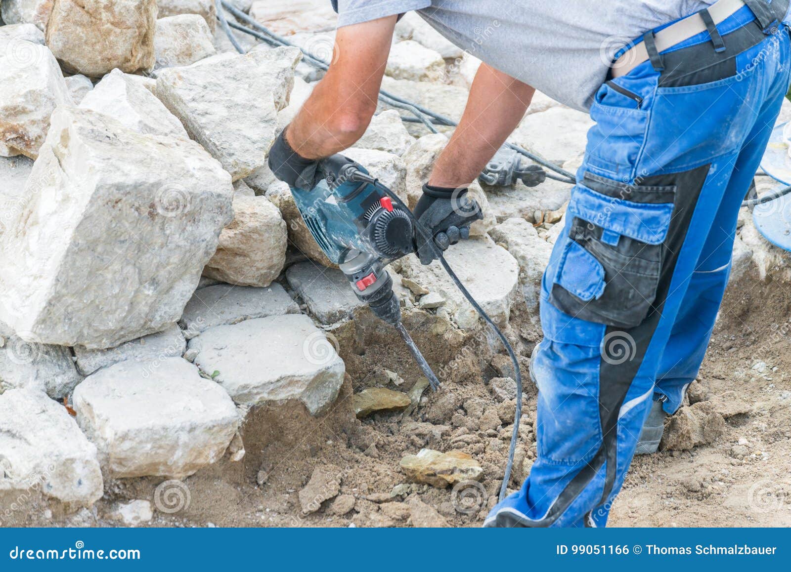 Construction Worker is Working with Granite Stones Stock Photo - Image ...