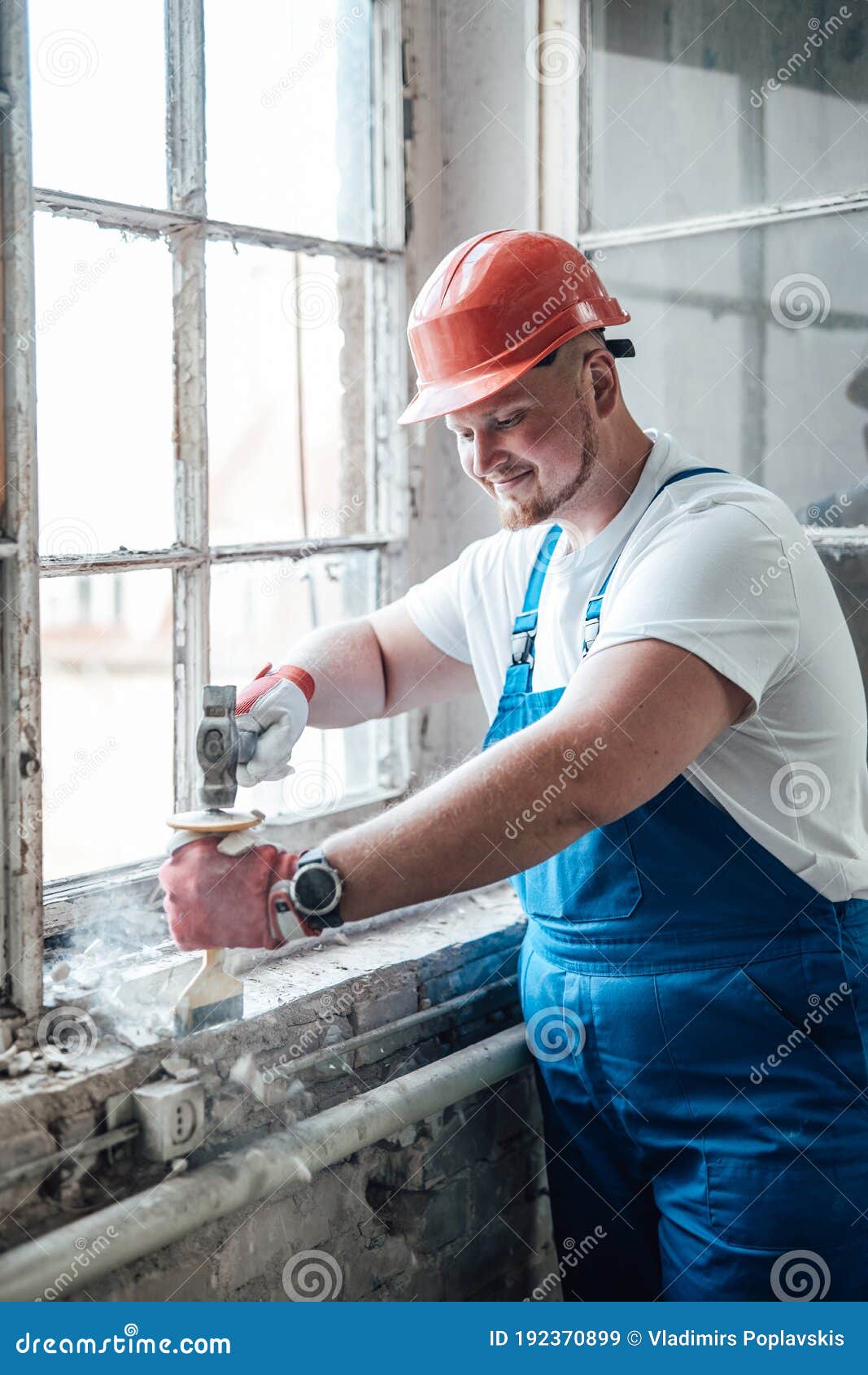 Construction Worker Working with a Hammer, Destroying Old Brick Walls ...