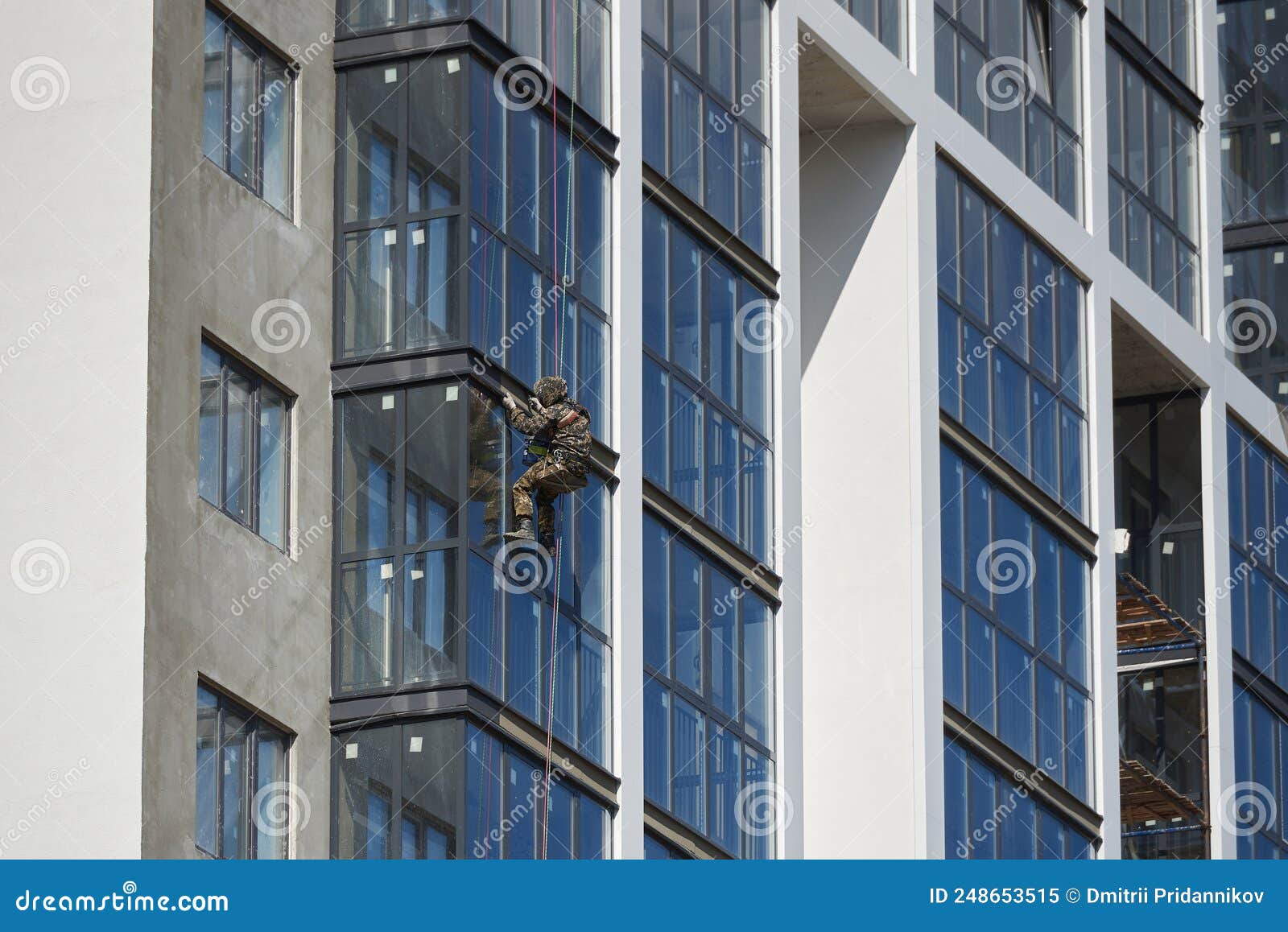 Construction Worker Working at High Outside the Building Stock Image ...