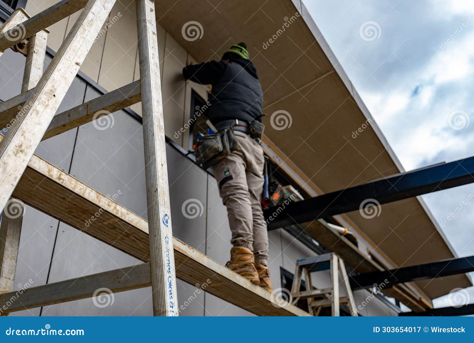 Construction Worker Working on a House Renovation and Extension ...