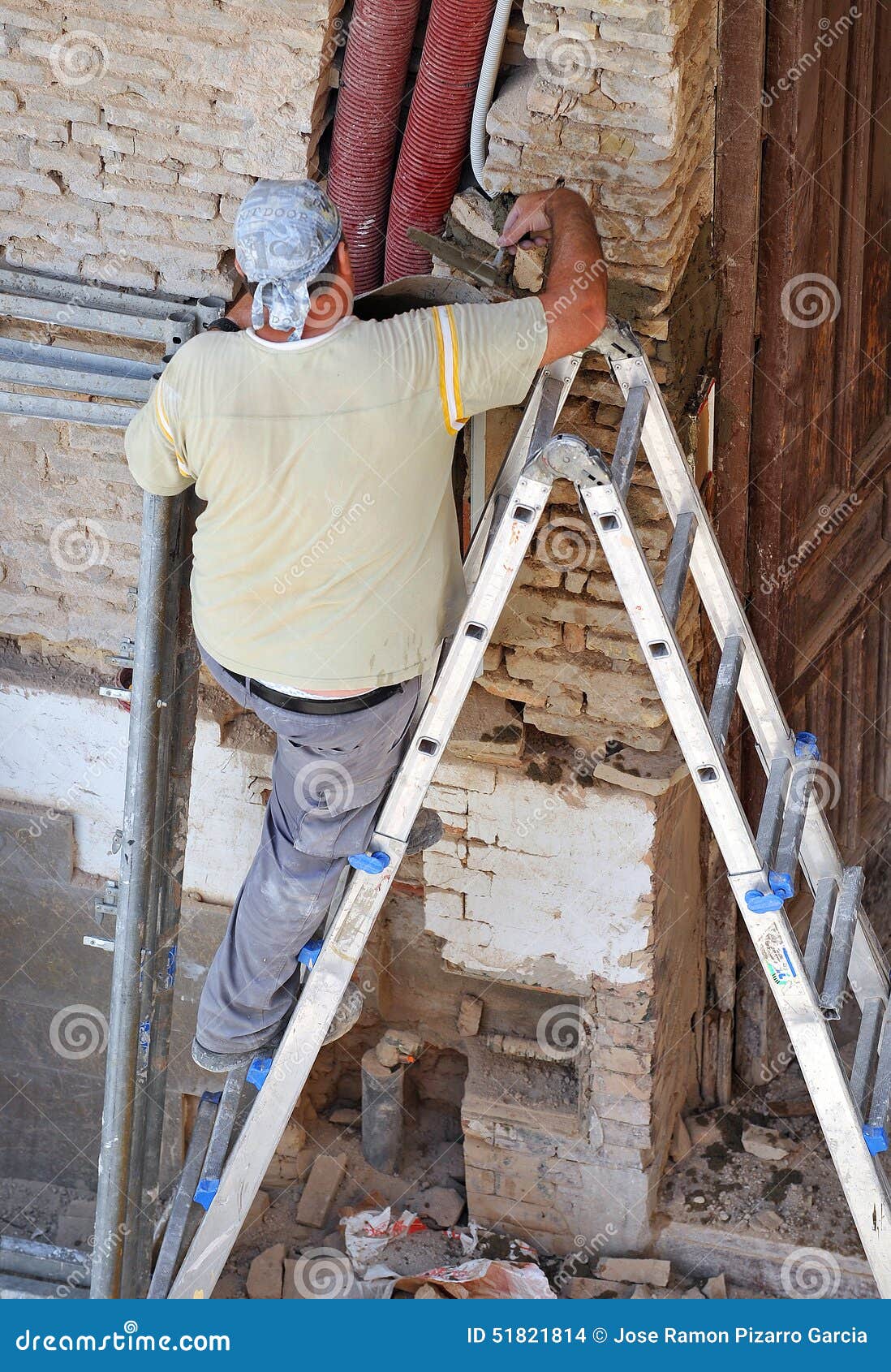 Construction Worker Working on the Rehabilitation of an Old House ...