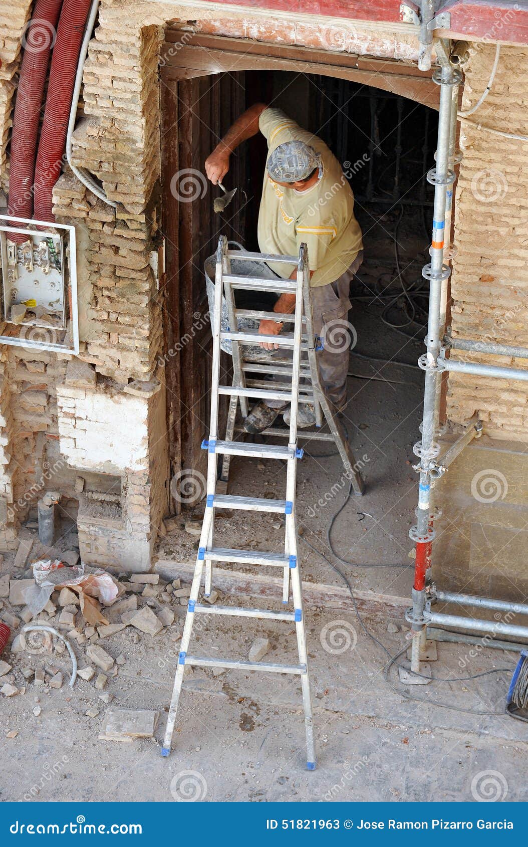 Construction Worker Working on the Rehabilitation of an Old House ...