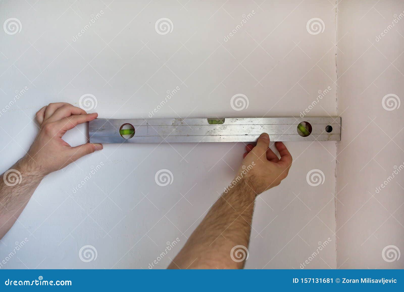 Construction Worker is Working on Renovation of Apartment. Builder is ...