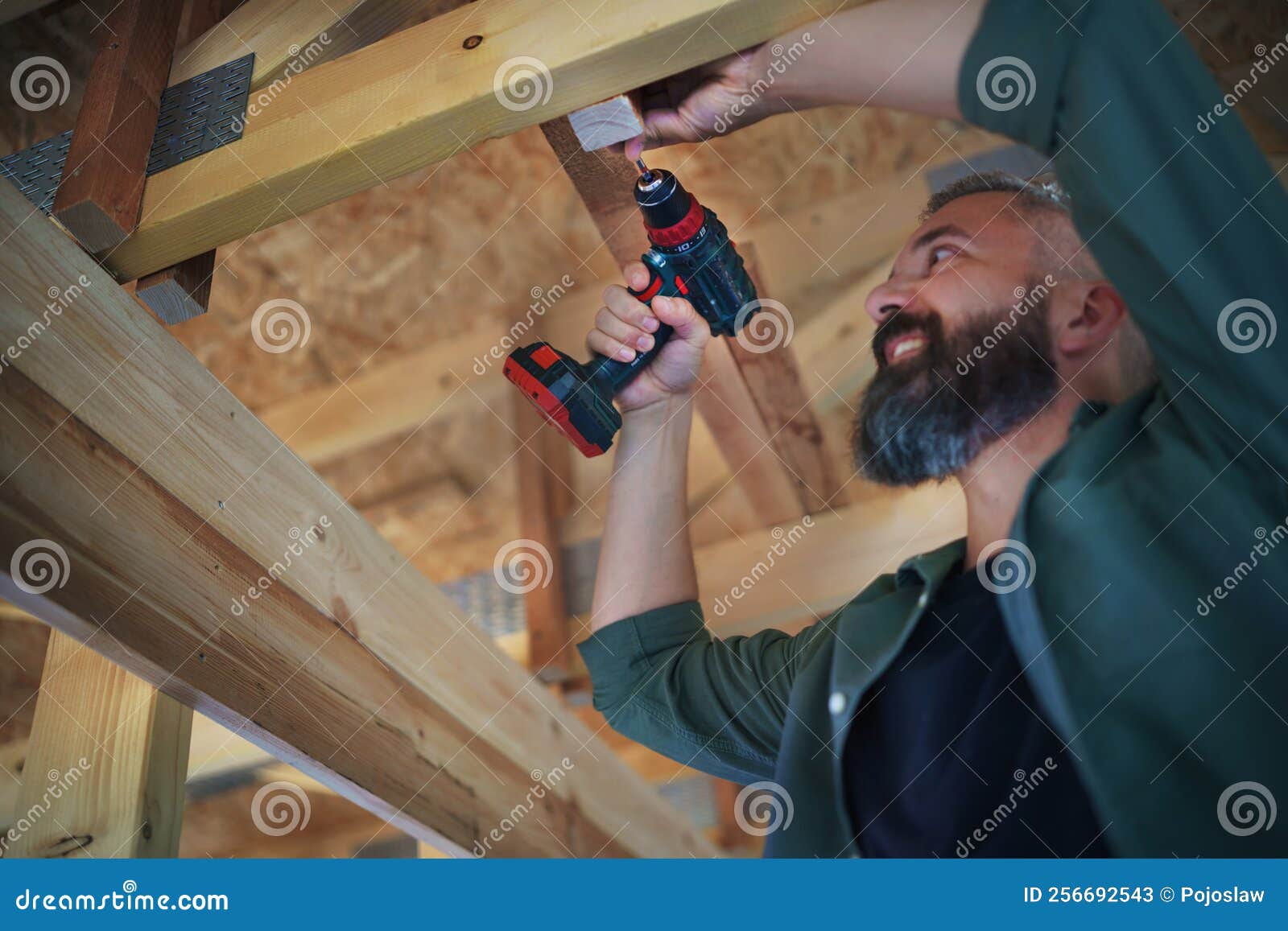 Construction Worker Working with Screwdriver on Wooden Frame, Diy Eco ...