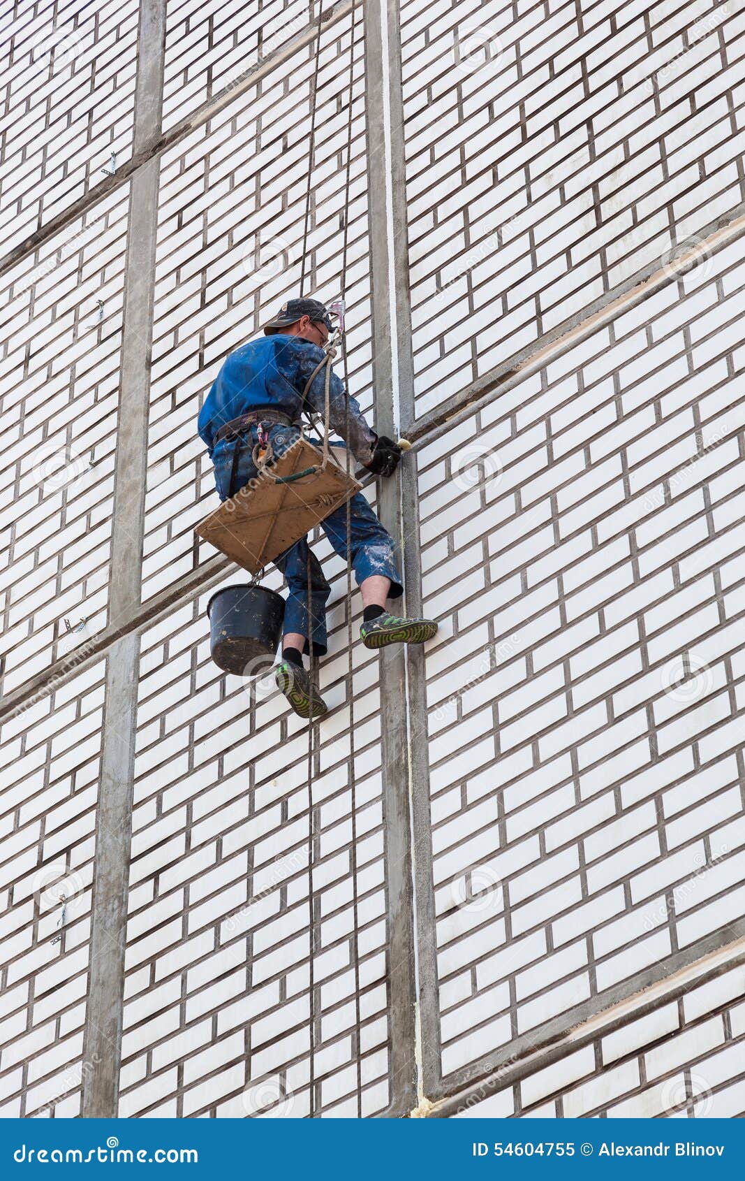 Construction Worker Working on Side of House Editorial Image - Image of ...