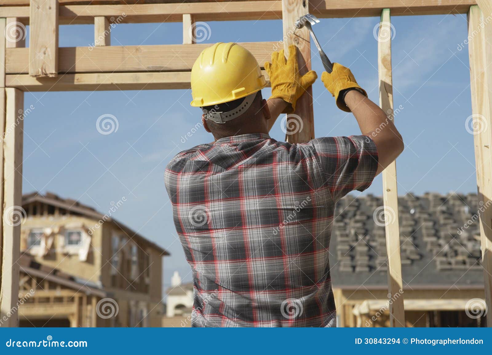 Construction Worker Working on Timber Frame Stock Photo - Image of ...