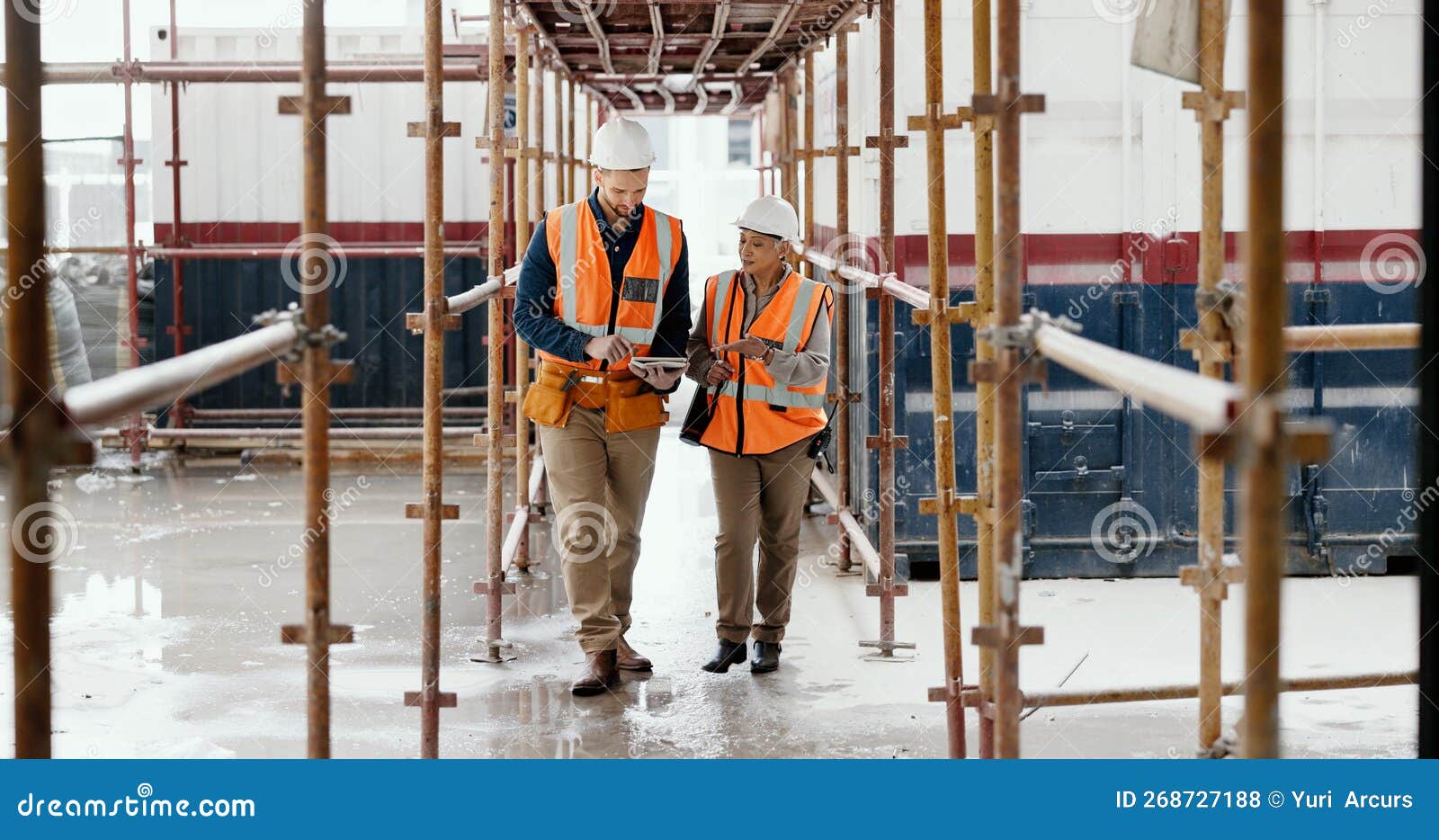 Construction Worker, Working Together and Conversation with Tablet ...