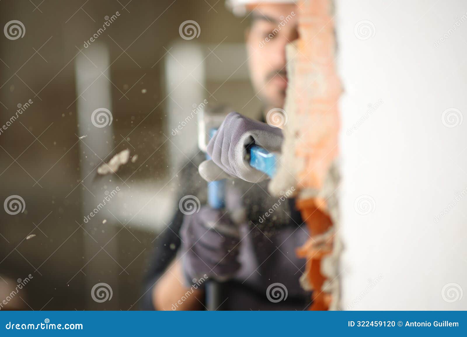 Construction Worker Wrecking Wall Using Escarpment and Hammer Stock ...