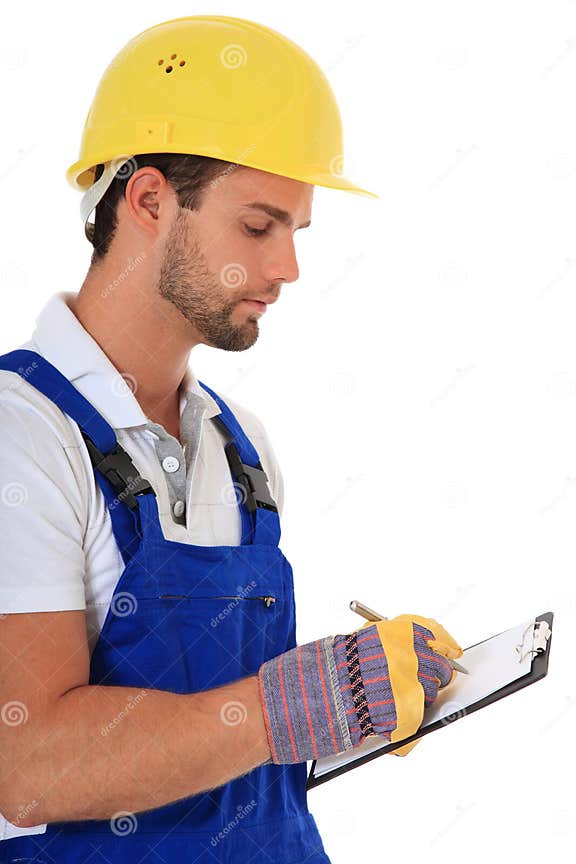 Construction Worker Writing on Clipboard Stock Photo - Image of ...