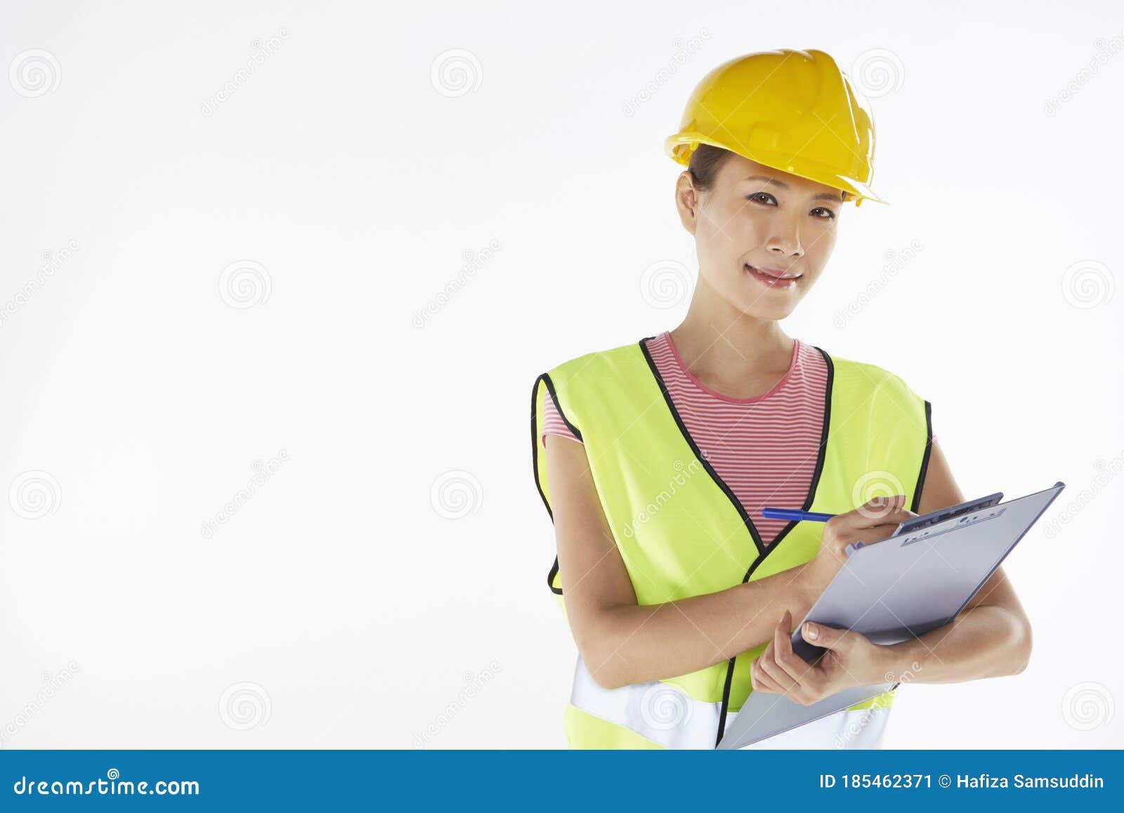 Construction Worker Writing Down Notes Stock Image - Image of cheerful ...